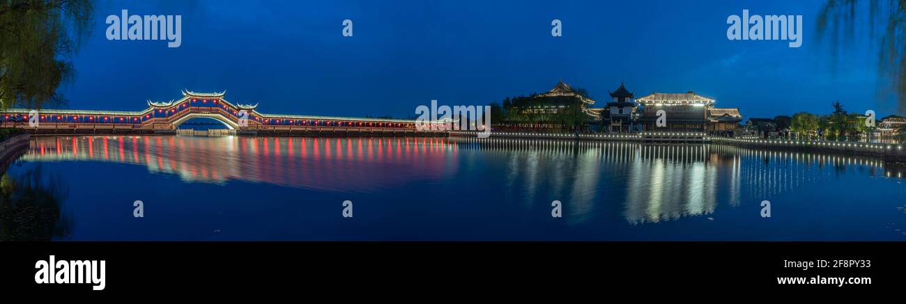Landscapes of the ancient buildings in Jinxi at night, a historic canal ...