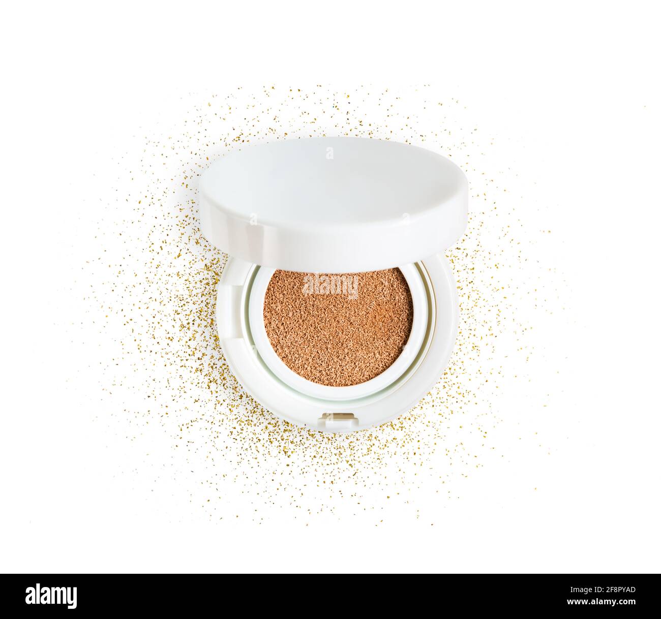 Foundation cushion powder with puff. Cosmetic face powder in the golden ...