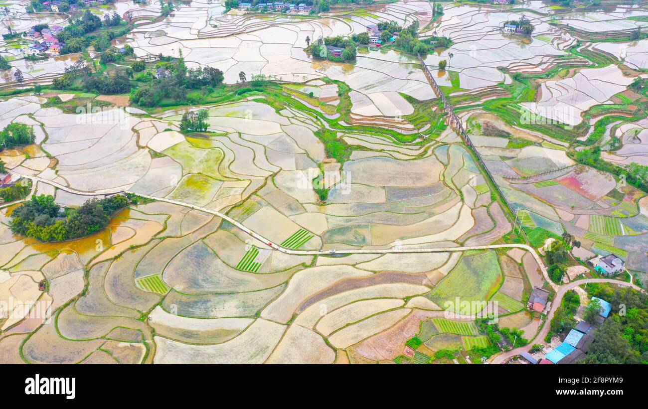 CHONGQING, CHINA - APRIL 15, 2021 - Villagers work in a field in ...