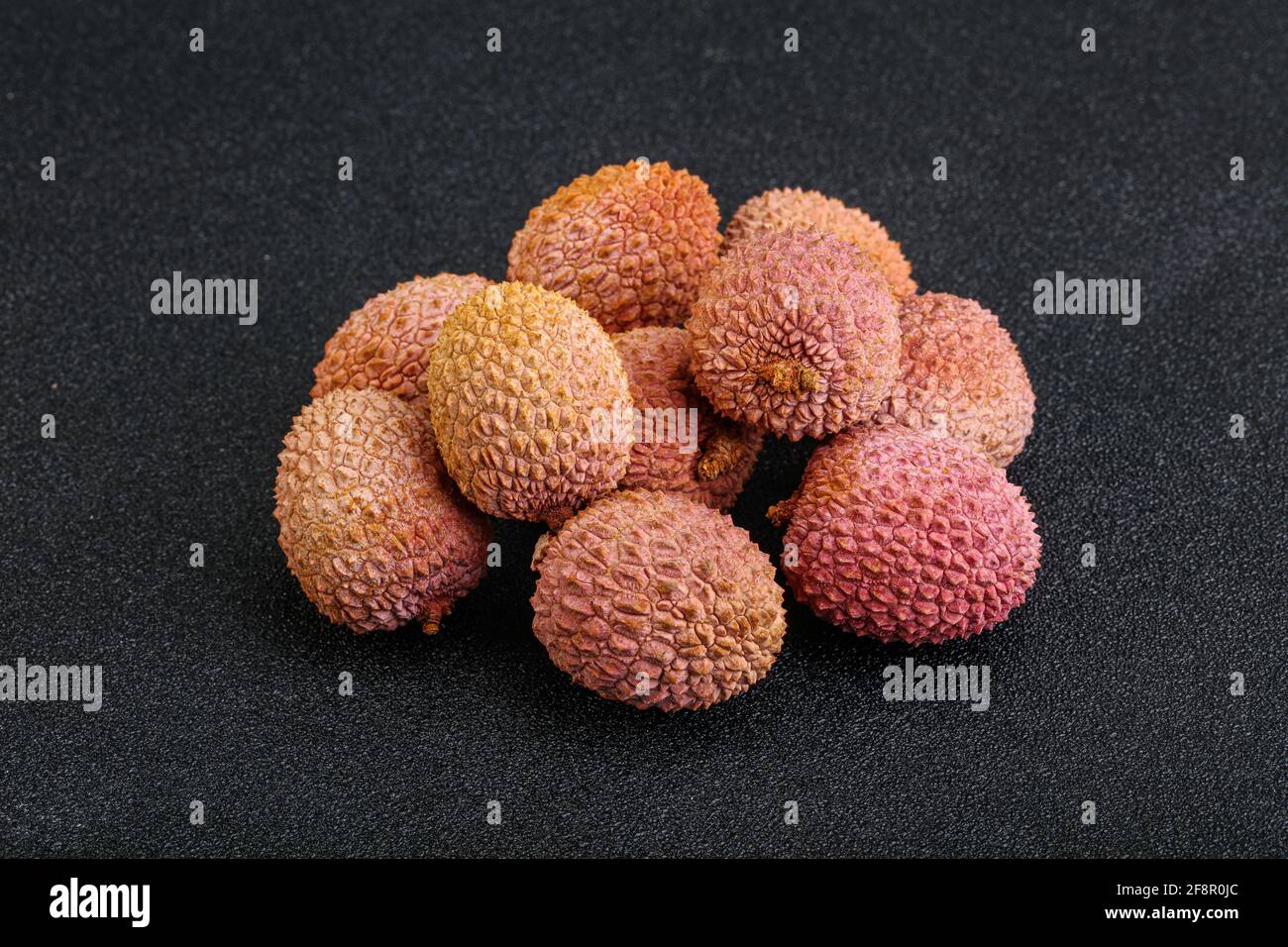 Tropical sweet exotic fruit lychee heap Stock Photo - Alamy