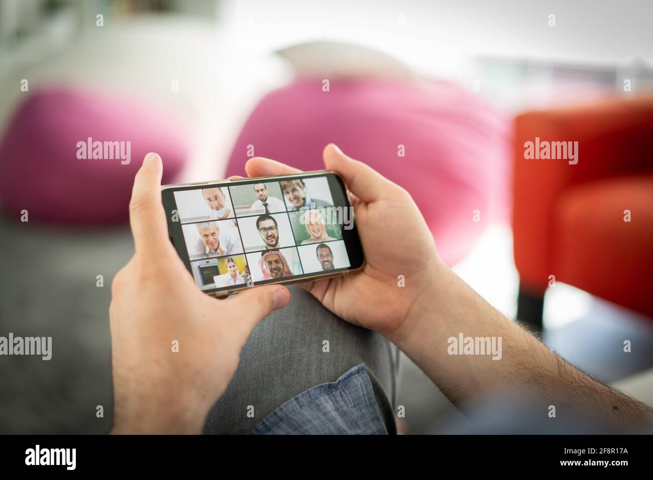 Online business conference screen in hands new normal Stock Photo - Alamy