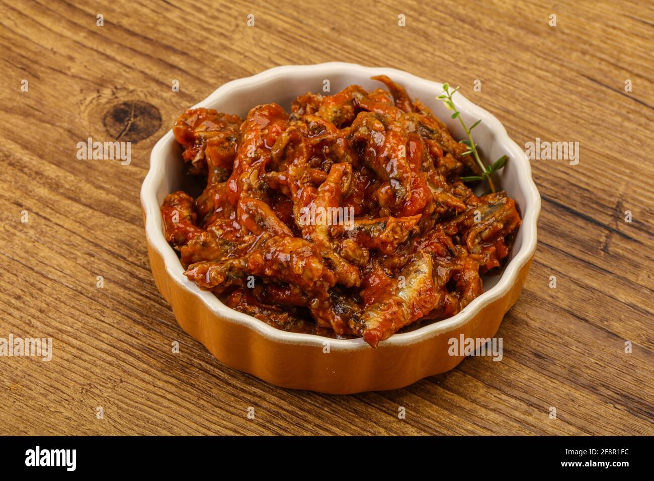 Canned anchovy snack in tomato sauce Stock Photo - Alamy