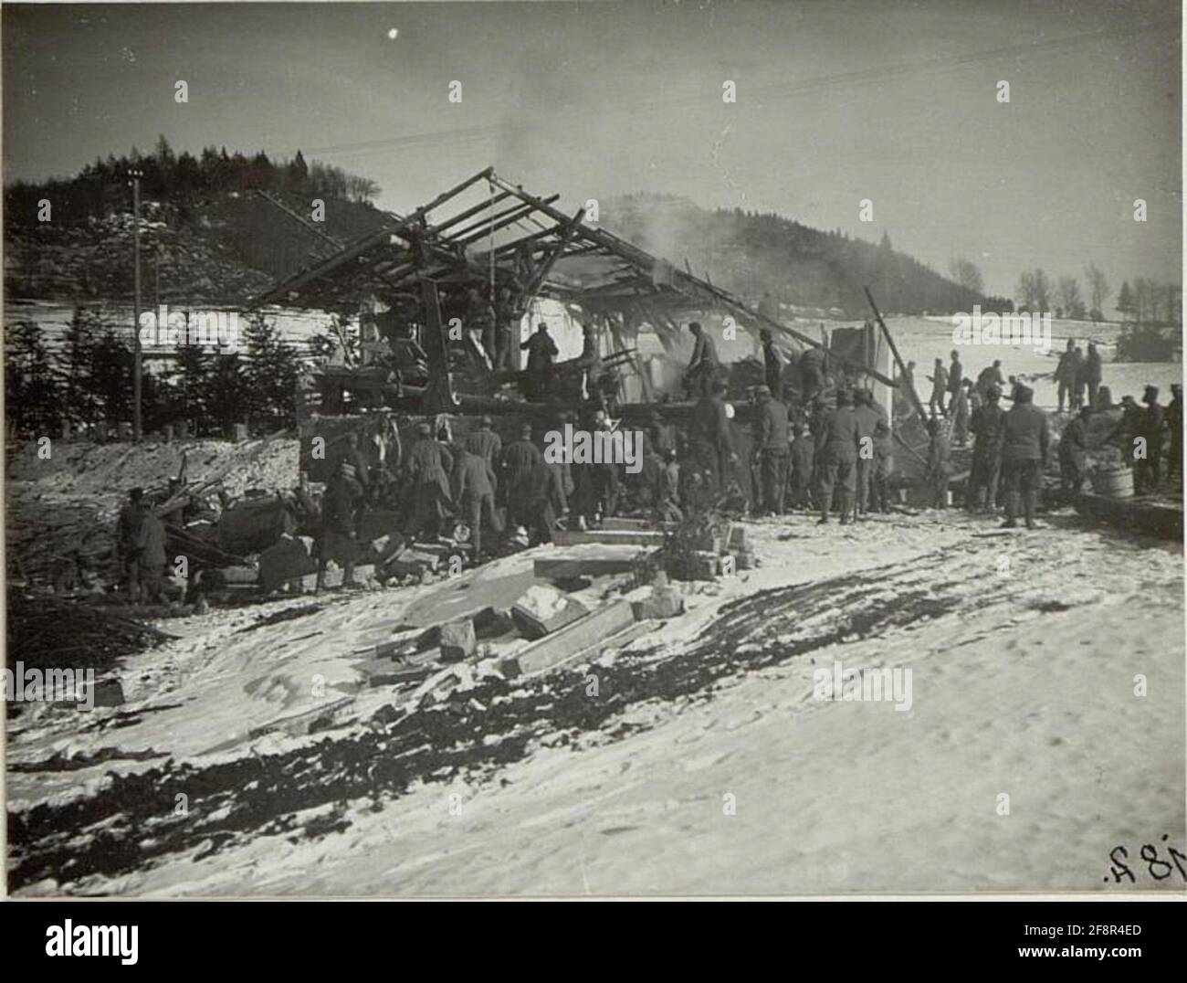 Clean up in a destroyed residential building Stock Photo - Alamy