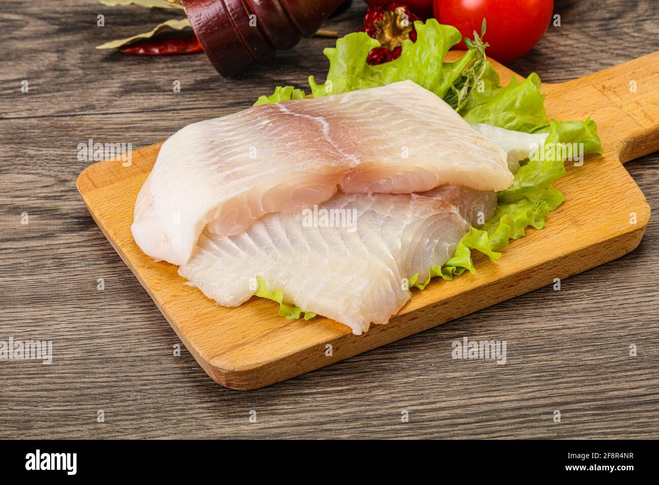 Raw pangasius fillet fish for cooking Stock Photo - Alamy