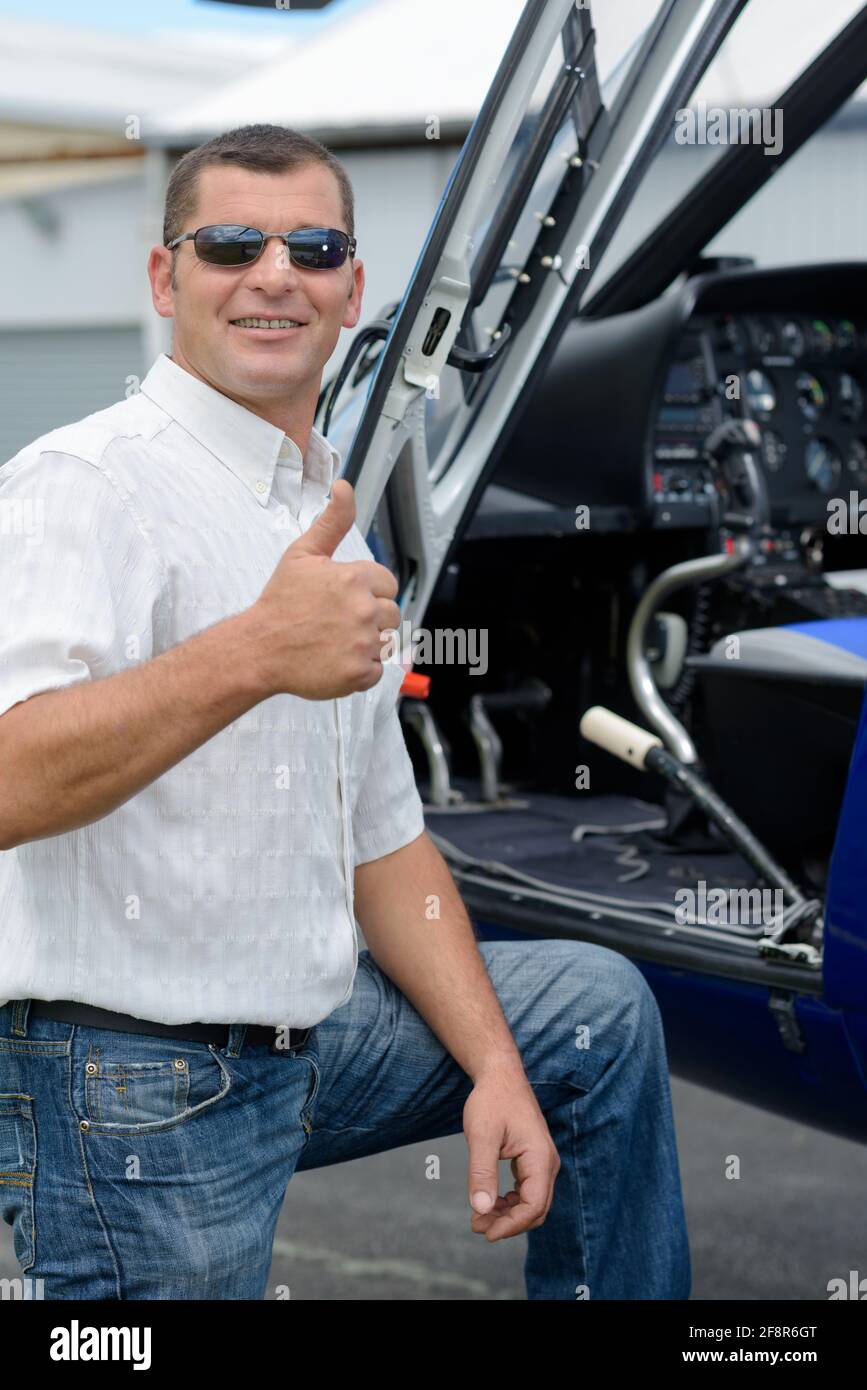 pilot making positive hand gesture Stock Photo - Alamy