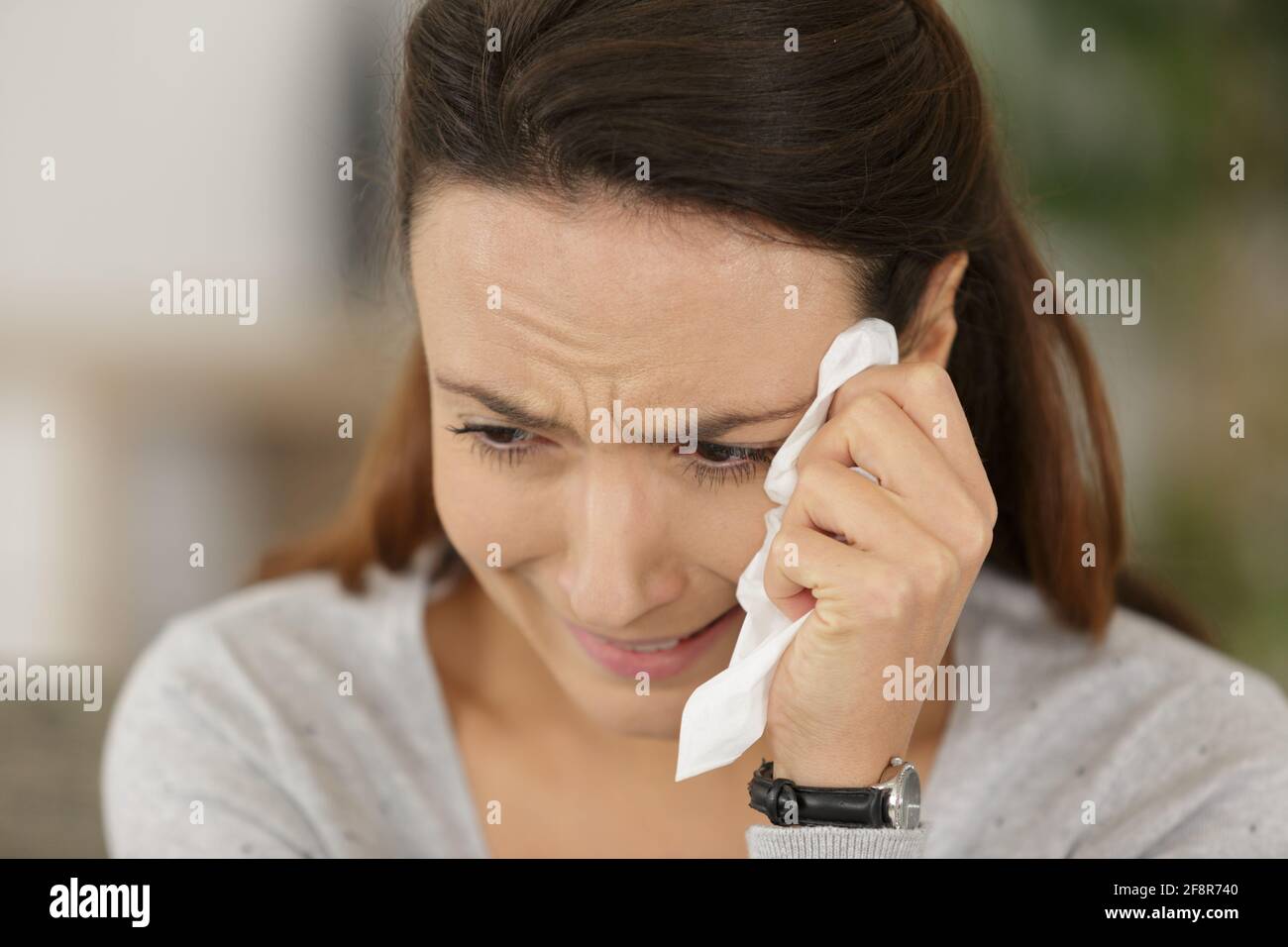 sad woman crying at home Stock Photo - Alamy