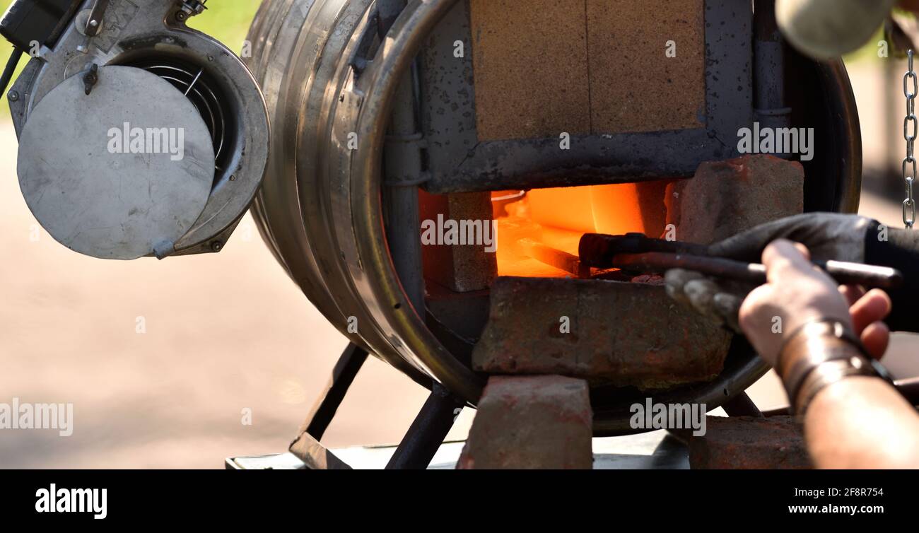 a furnace in the forge where the steel detail is heated Stock Photo - Alamy