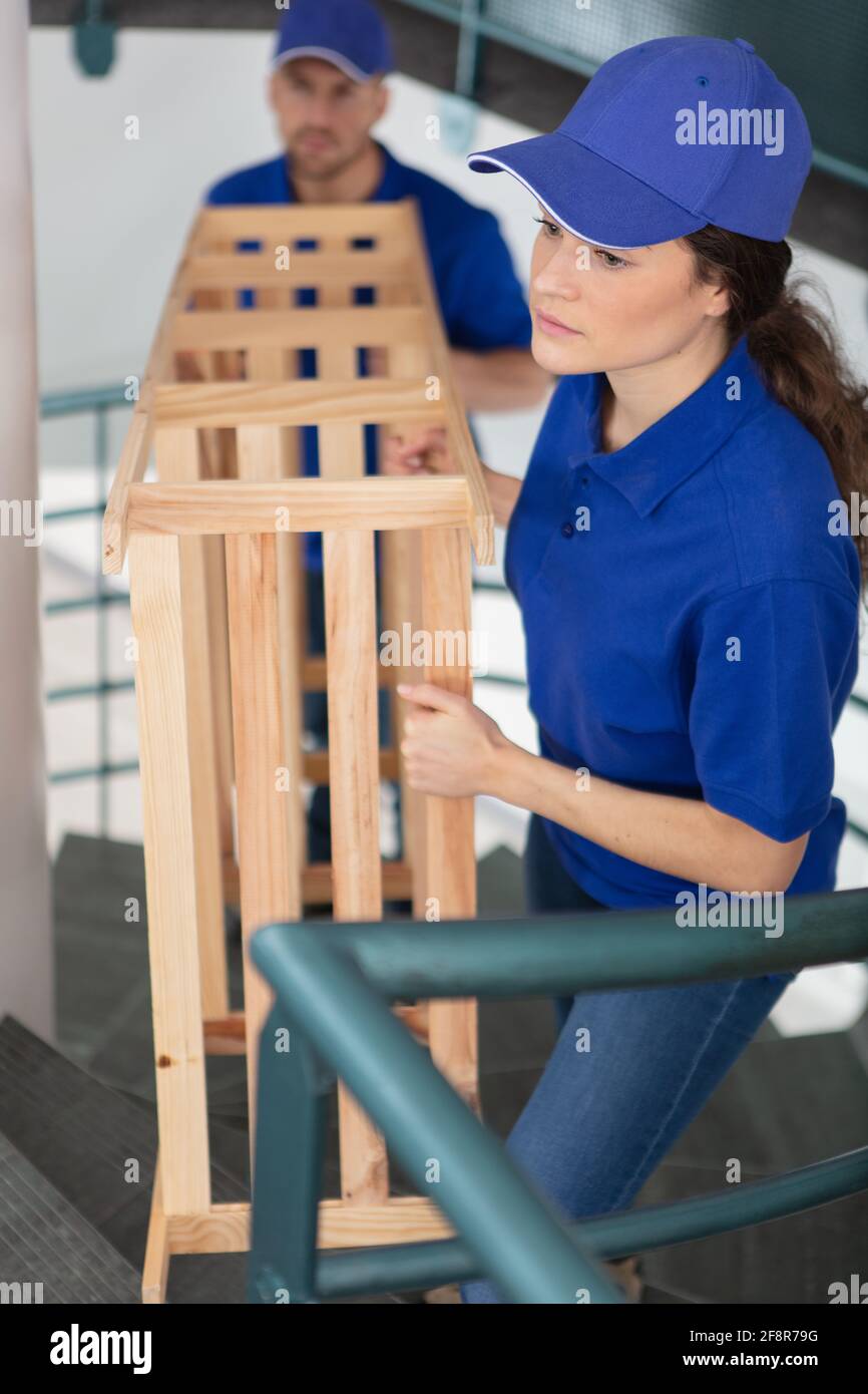 Man moving wooden crate hi-res stock photography and images - Alamy
