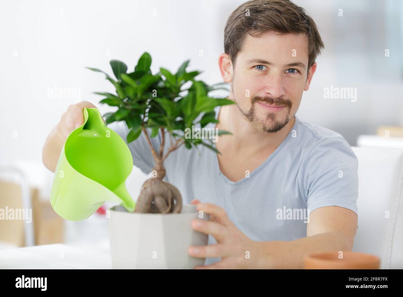 Portrait young asian male gardener hi-res stock photography and images ...