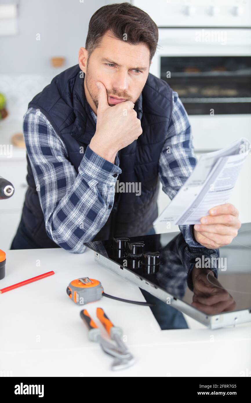 Induction cooking male hi-res stock photography and images - Alamy