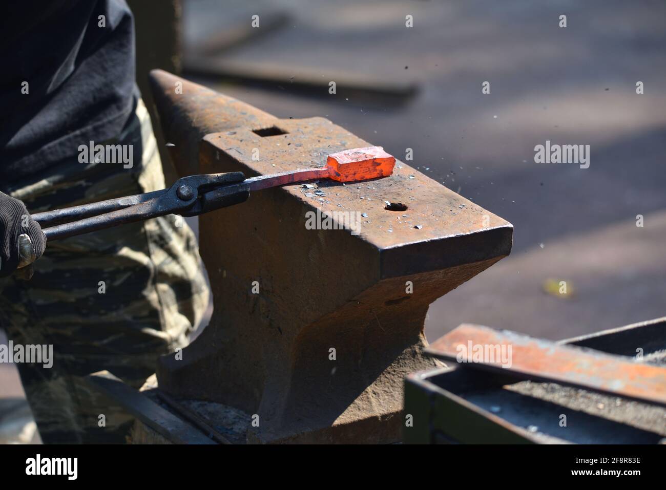 forging damascus steel by hand on the anvil Stock Photo - Alamy