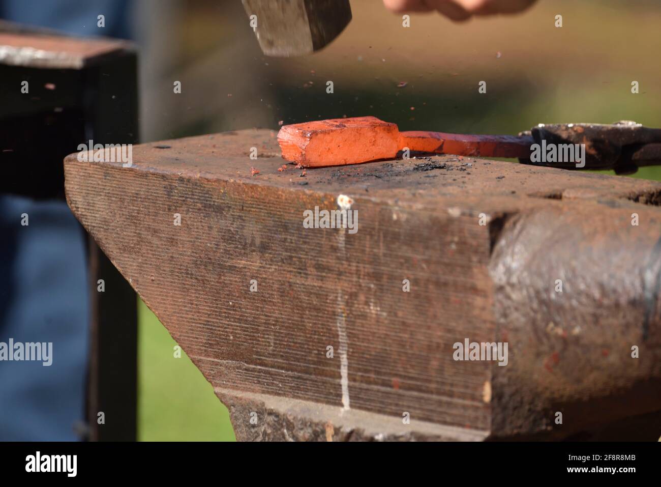 forging damascus steel by hand on the anvil Stock Photo - Alamy