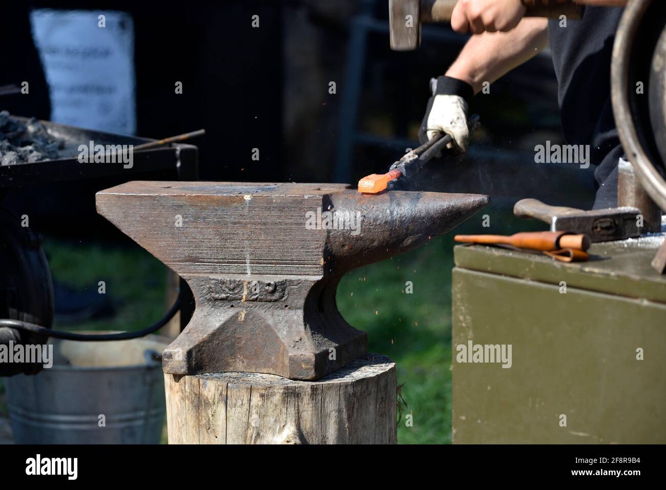 forging damascus steel by hand on the anvil Stock Photo - Alamy