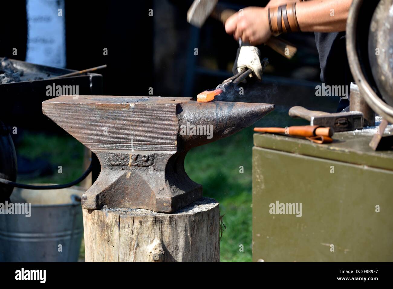 forging damascus steel by hand on the anvil Stock Photo - Alamy