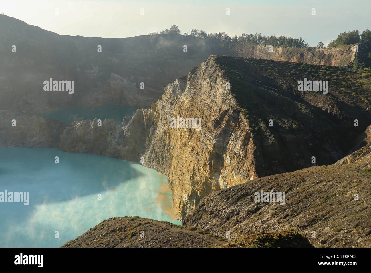 Spectacular view of blue and turquoise lakes on Kelimutu volcano ...
