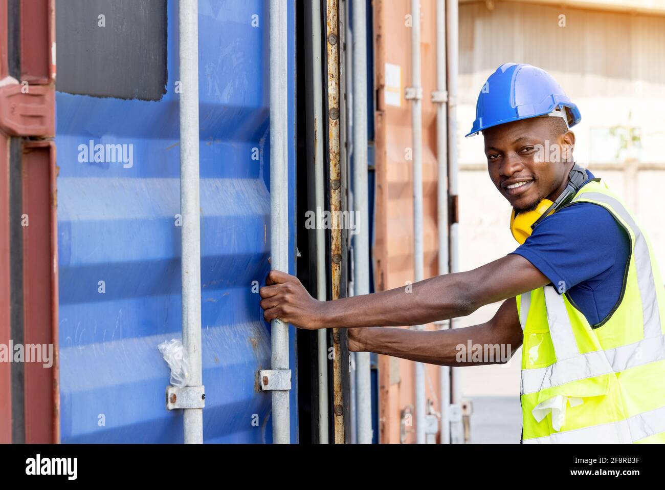 African-American black workers are opening containers for inspection ...