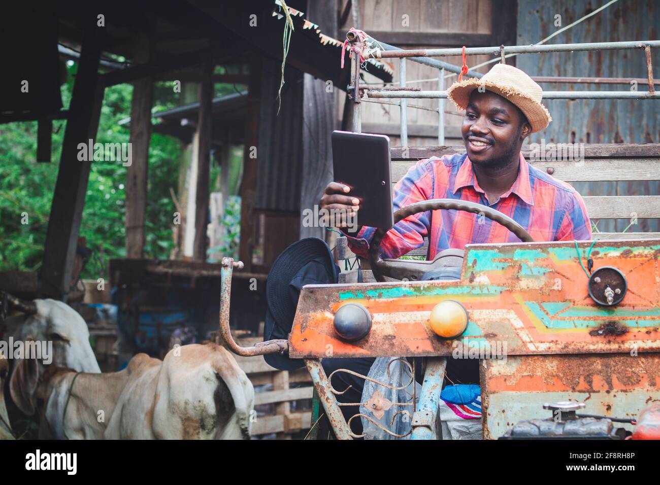 Farmer tractor africa hi-res stock photography and images - Alamy