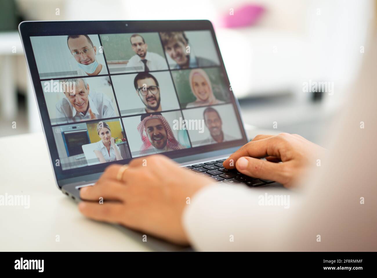 Online business conference screen in hands new normal Stock Photo - Alamy