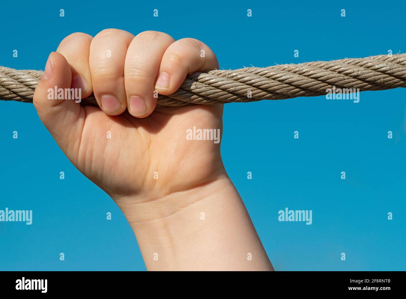 Hand gripping rope hi-res stock photography and images - Alamy