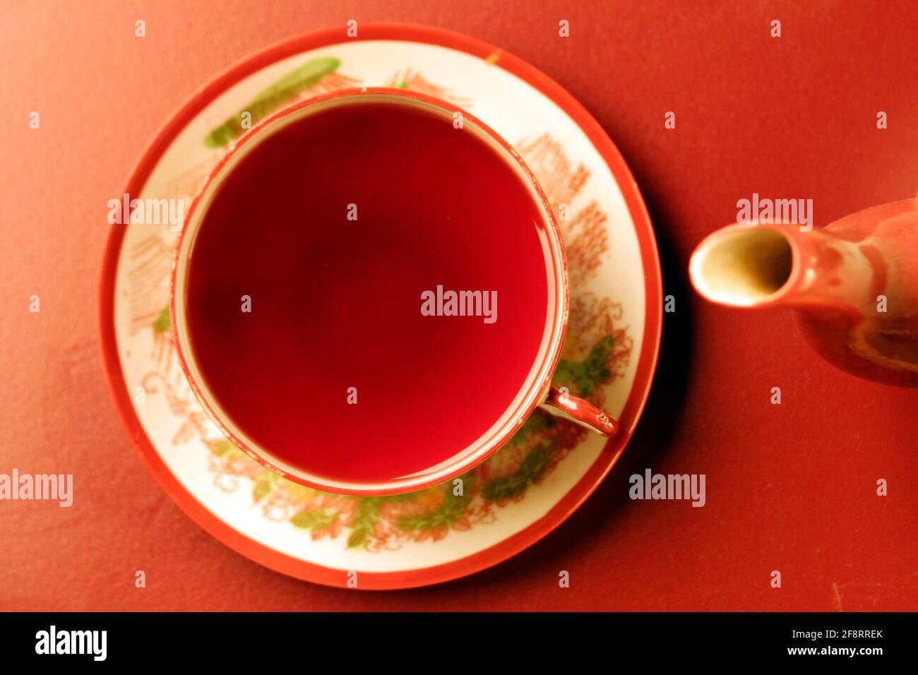 tea can with tea cup Stock Photo - Alamy