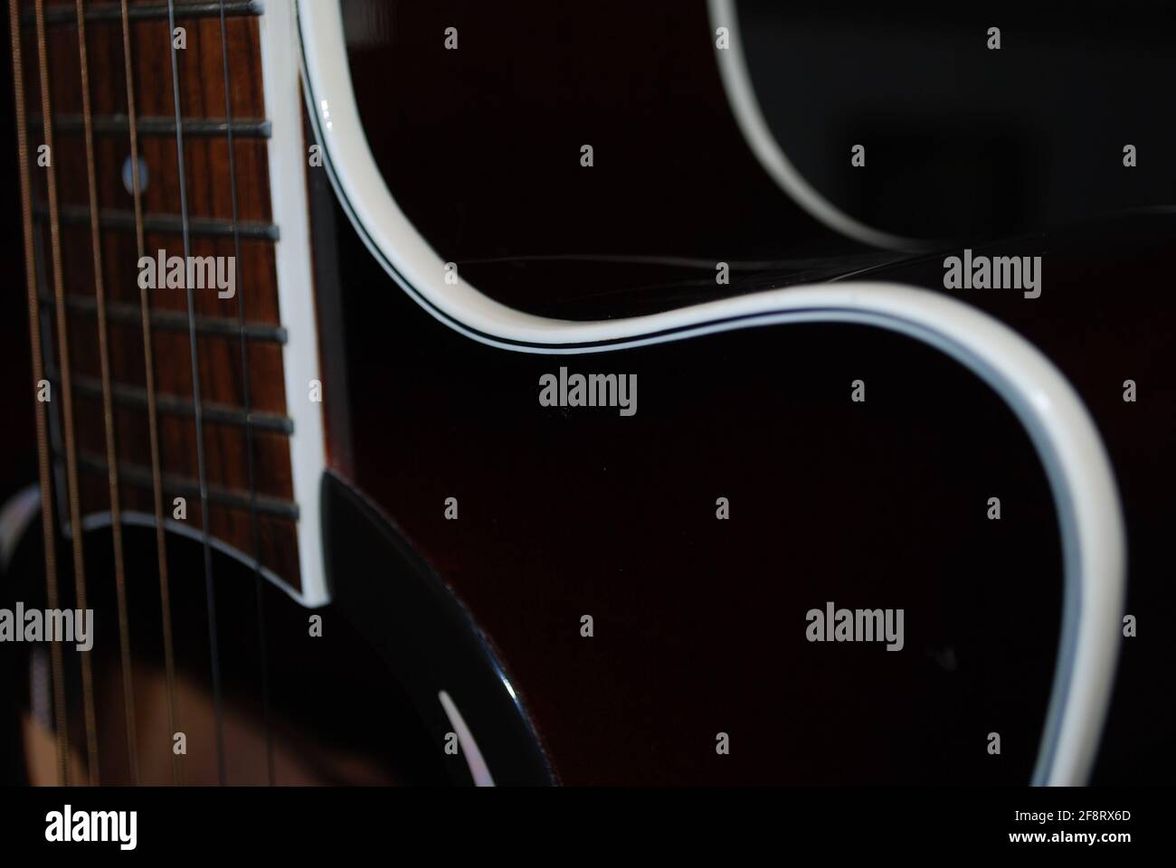 Guitar curves 3 Stock Photo - Alamy