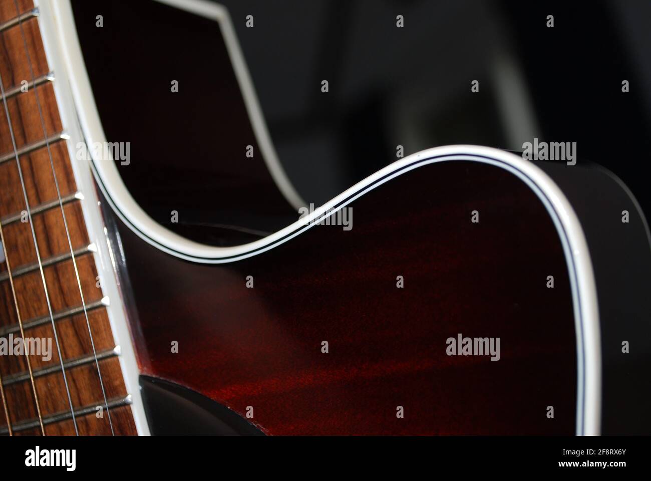 Guitar curves 2 Stock Photo - Alamy