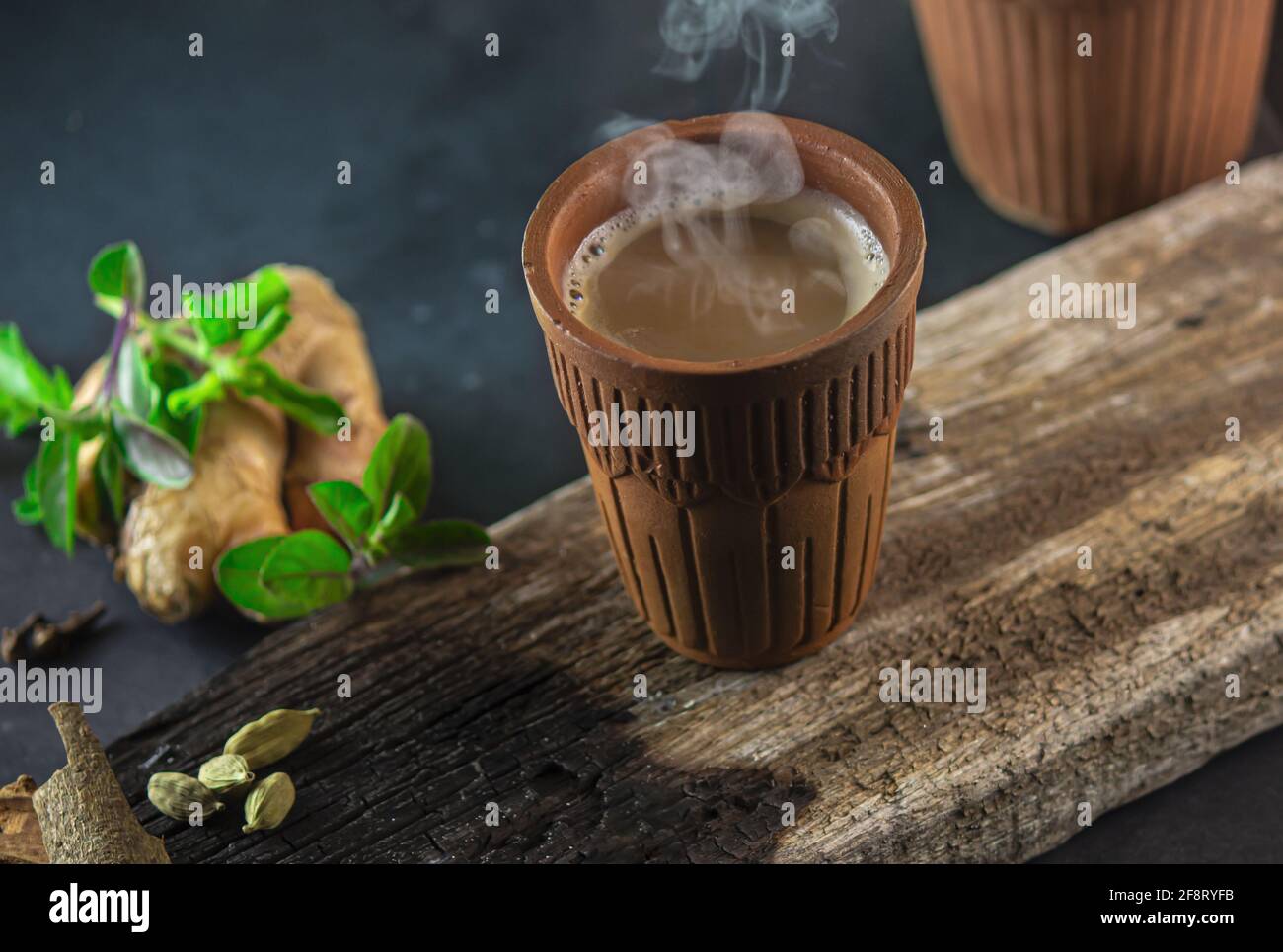 Hot Tandoori Tea (Indian milk tea) with its ingredients Stock Photo - Alamy