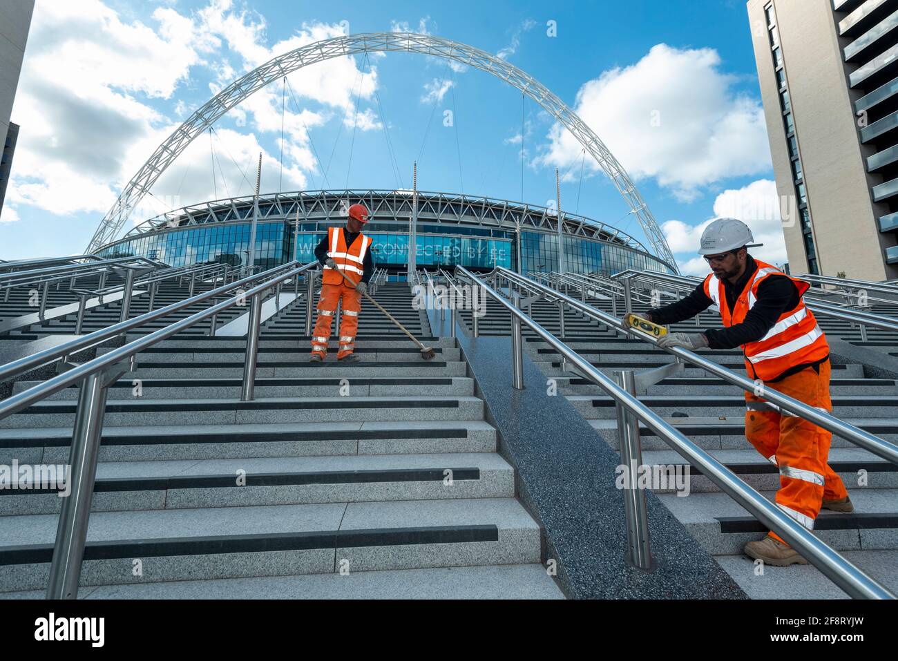 London, UK. 15 April 2021. Construction workers on the soon to be ...