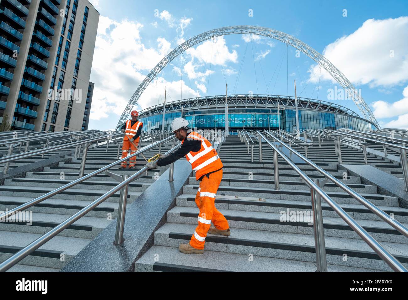 London, UK. 15 April 2021. Construction workers on the soon to be ...