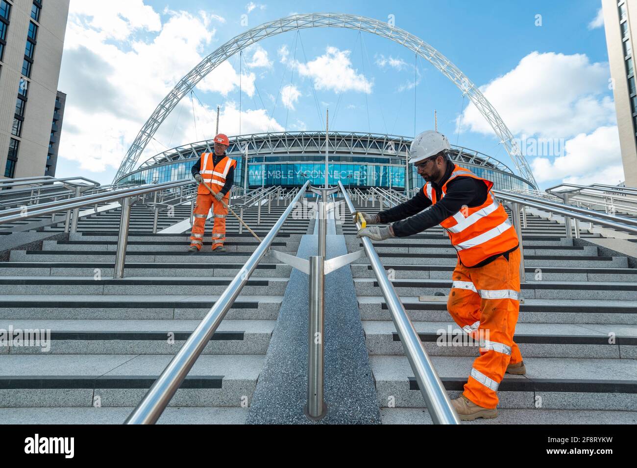 London, UK. 15 April 2021. Construction workers on the soon to be ...