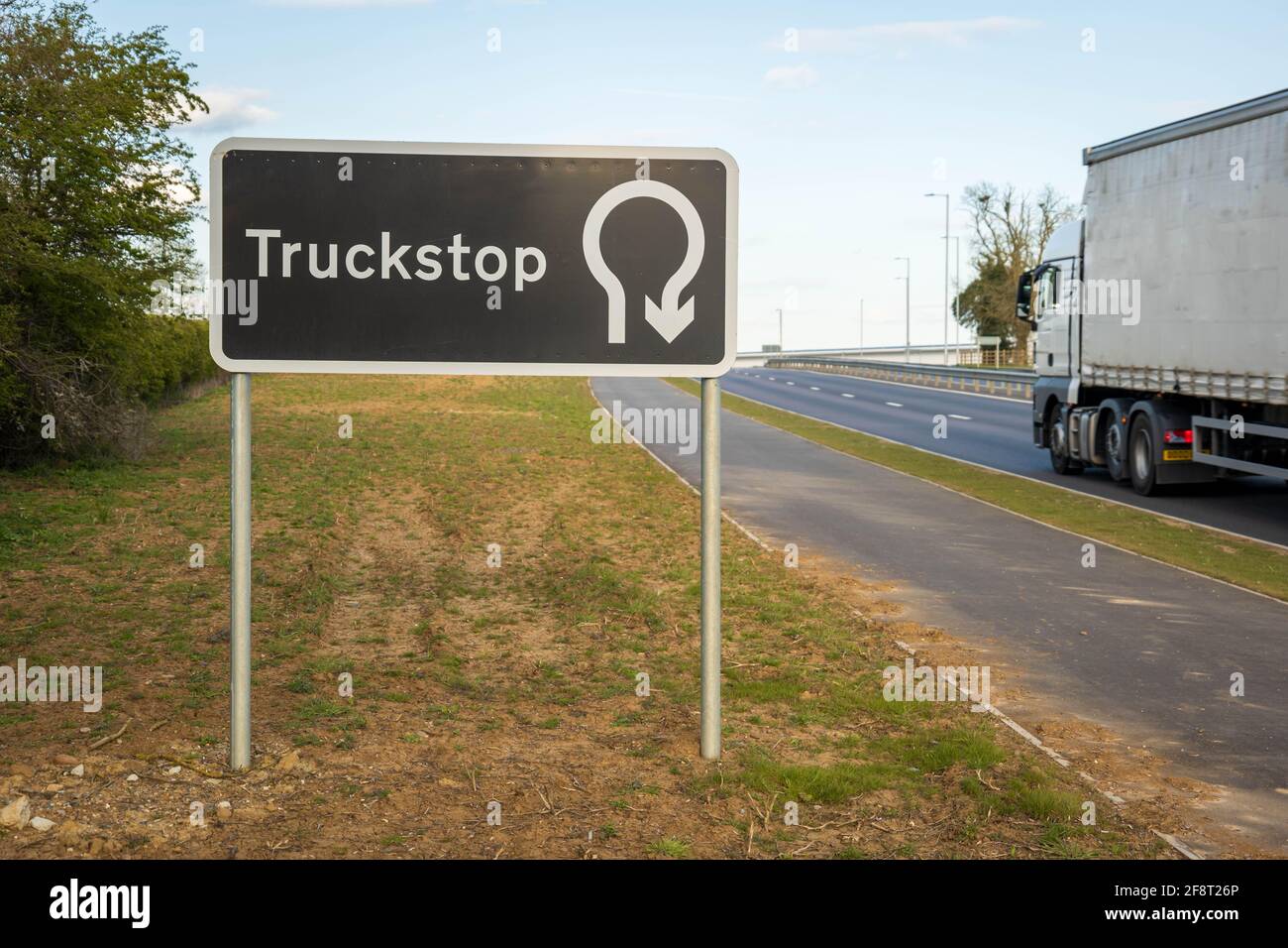 truck stop road sign on uk motorway in england Stock Photo - Alamy
