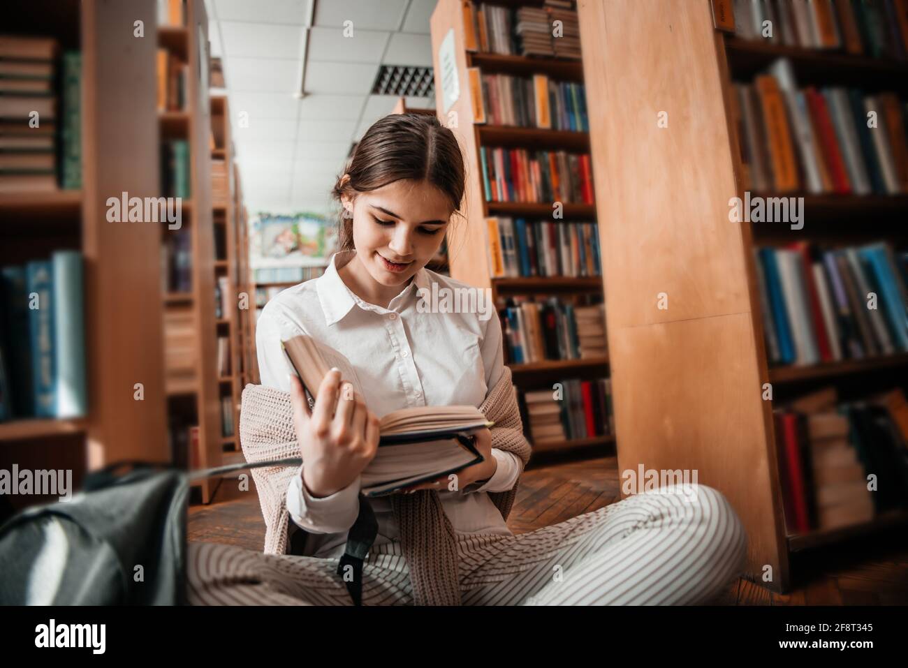 education, high school, university, learning concept - smiling student ...