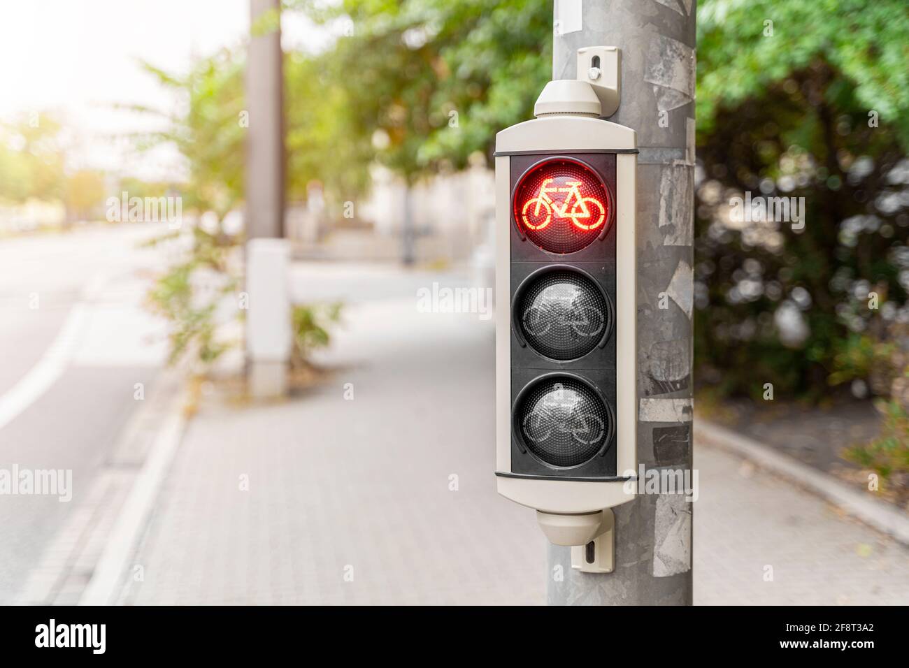 Traffic light for cyclists on a city road on a summer day Stock Photo ...