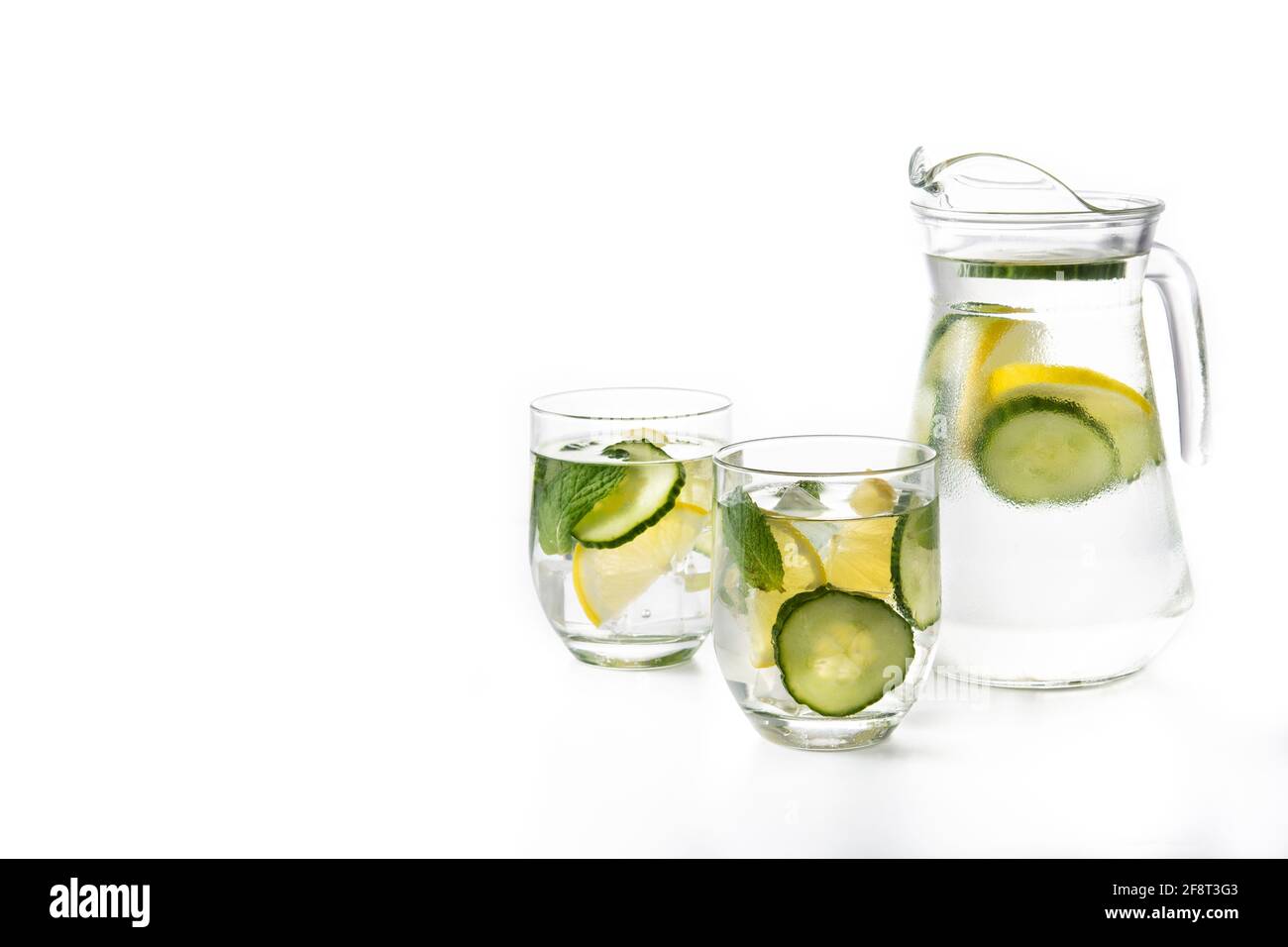 Sassy water or water with cucumber and lemon in jar isolated on white ...