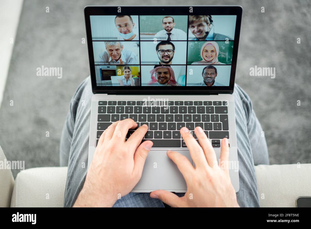 Online business conference screen in hands new normal Stock Photo - Alamy