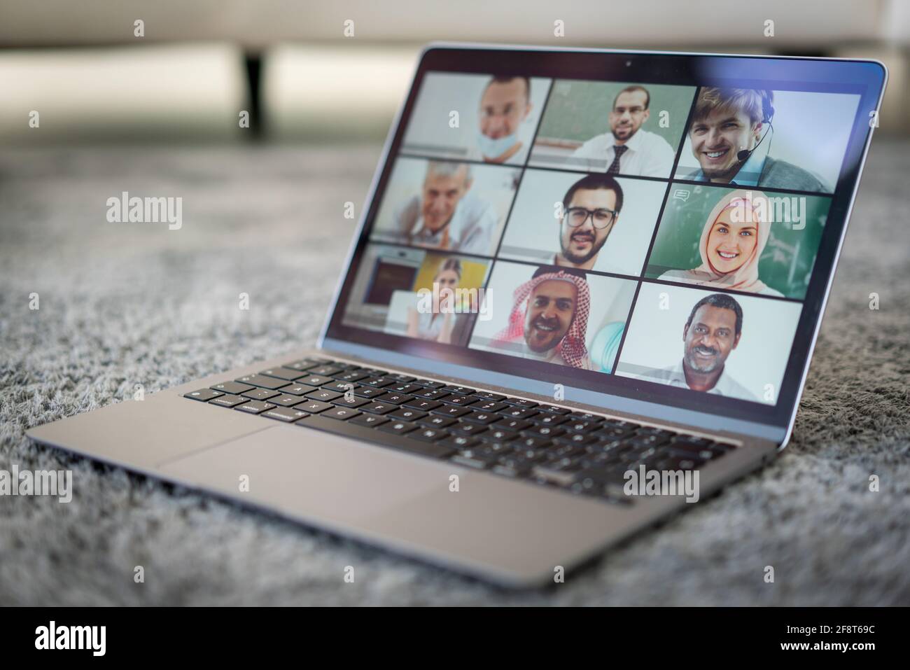 Online business conference screen in hands new normal Stock Photo - Alamy
