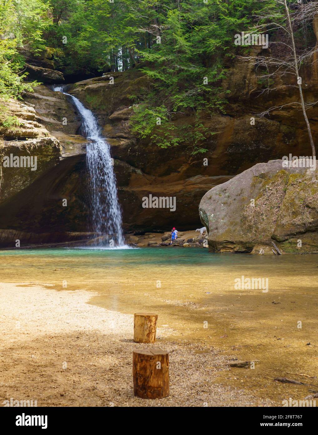 Breathtaking view of cascade along a hiking trail in Hocking Hills ...