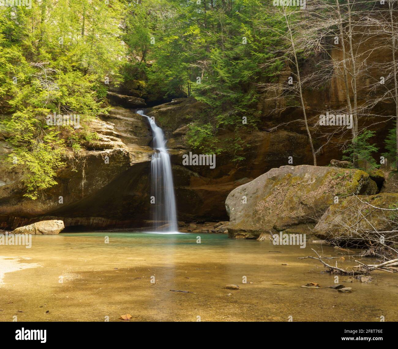 Breathtaking view of cascade along a hiking trail in Hocking Hills ...