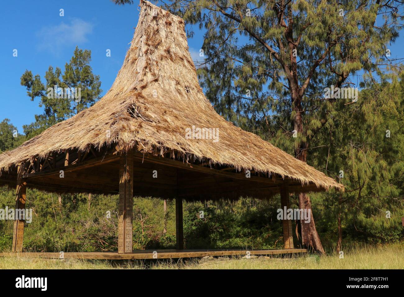 Shelter with a reed roof by the colorful lakes on the volcano Kelimutu ...