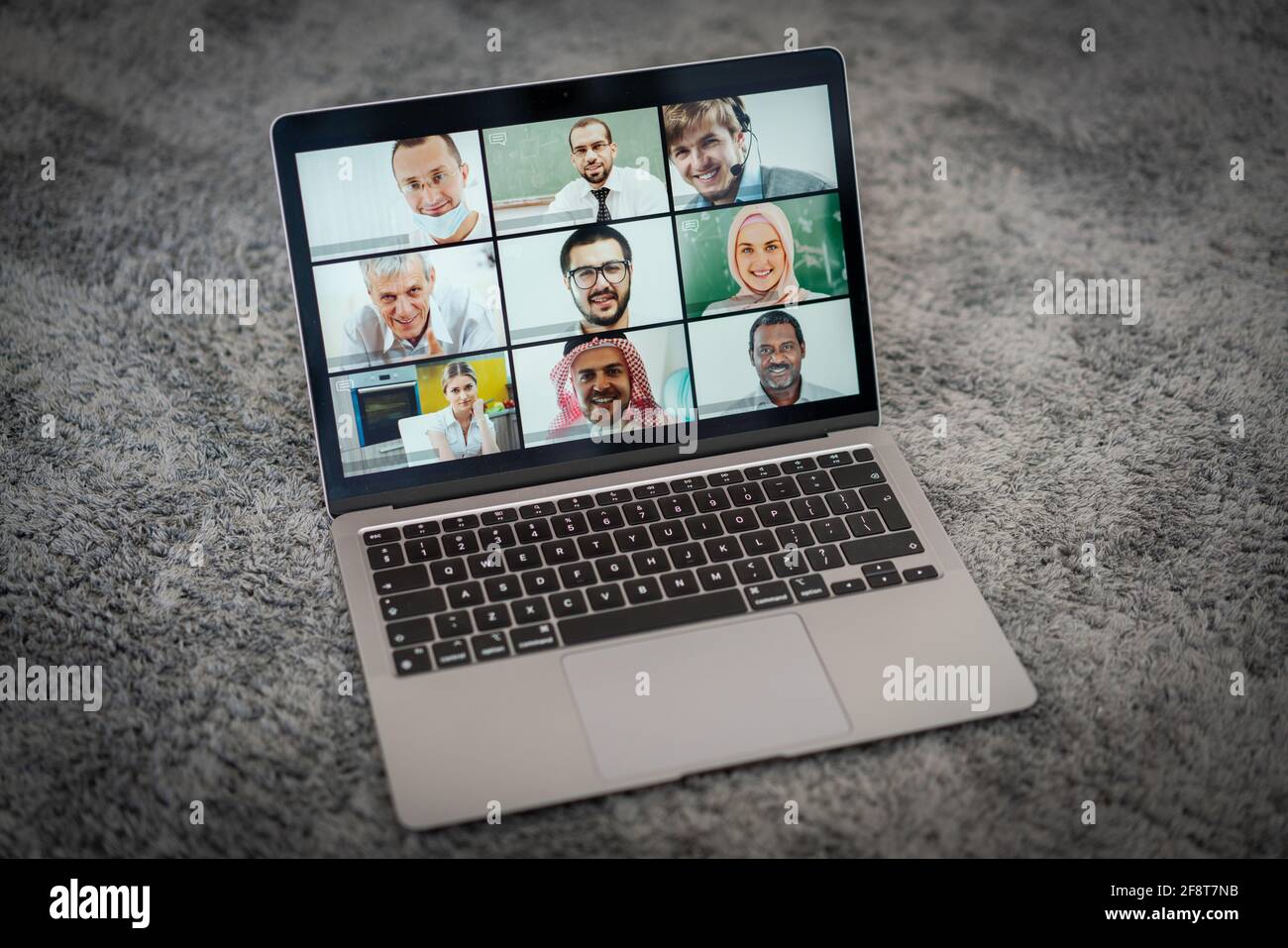 Online business conference screen in hands new normal Stock Photo - Alamy