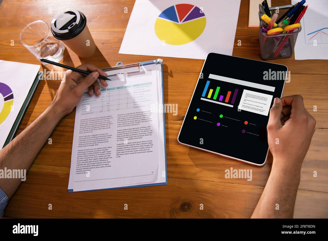 Close up manager working in modern office using devices and gadgets ...