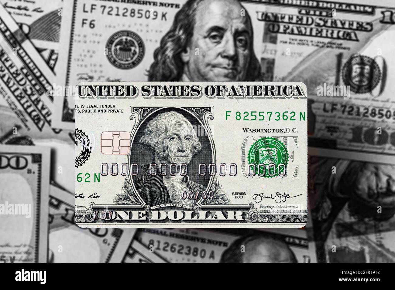 Debit card with 1 dollar design on US 100 dollar banknotes background ...