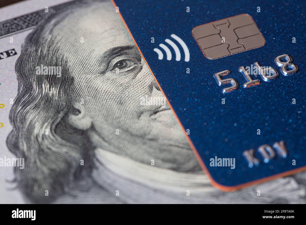 Debit card and US 100 dollar banknote for design purpose Stock Photo ...