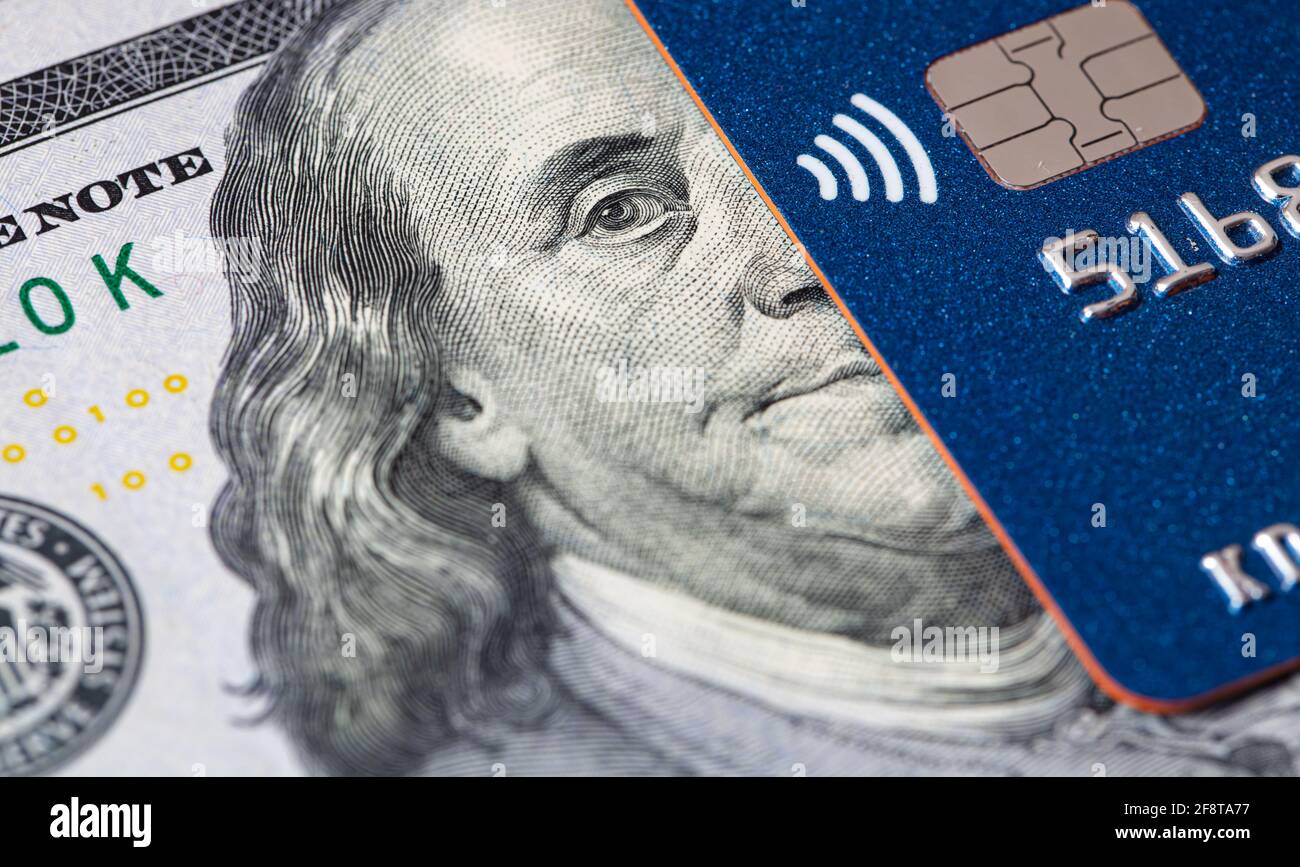 Debit card and US 100 dollar banknote for design purpose Stock Photo ...