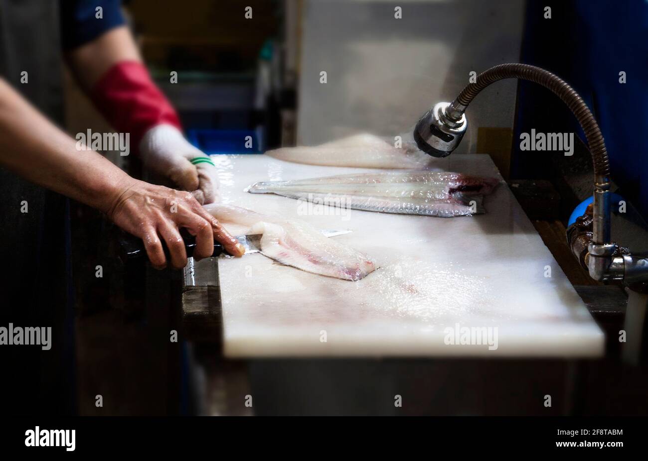 Sashimi Man's Hand Stock Photo - Alamy