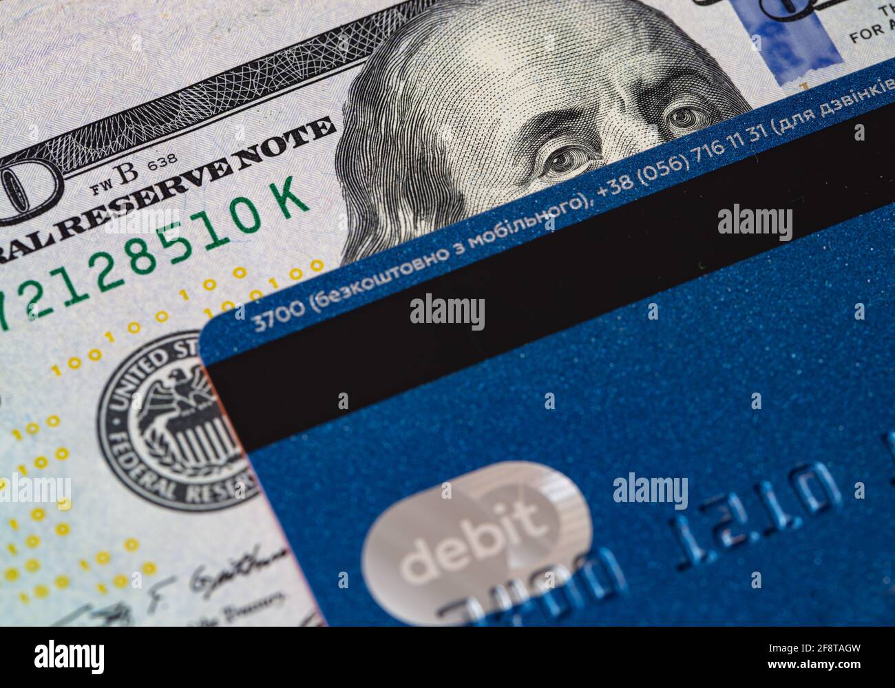 Debit card and US 100 dollar banknote for design purpose Stock Photo ...