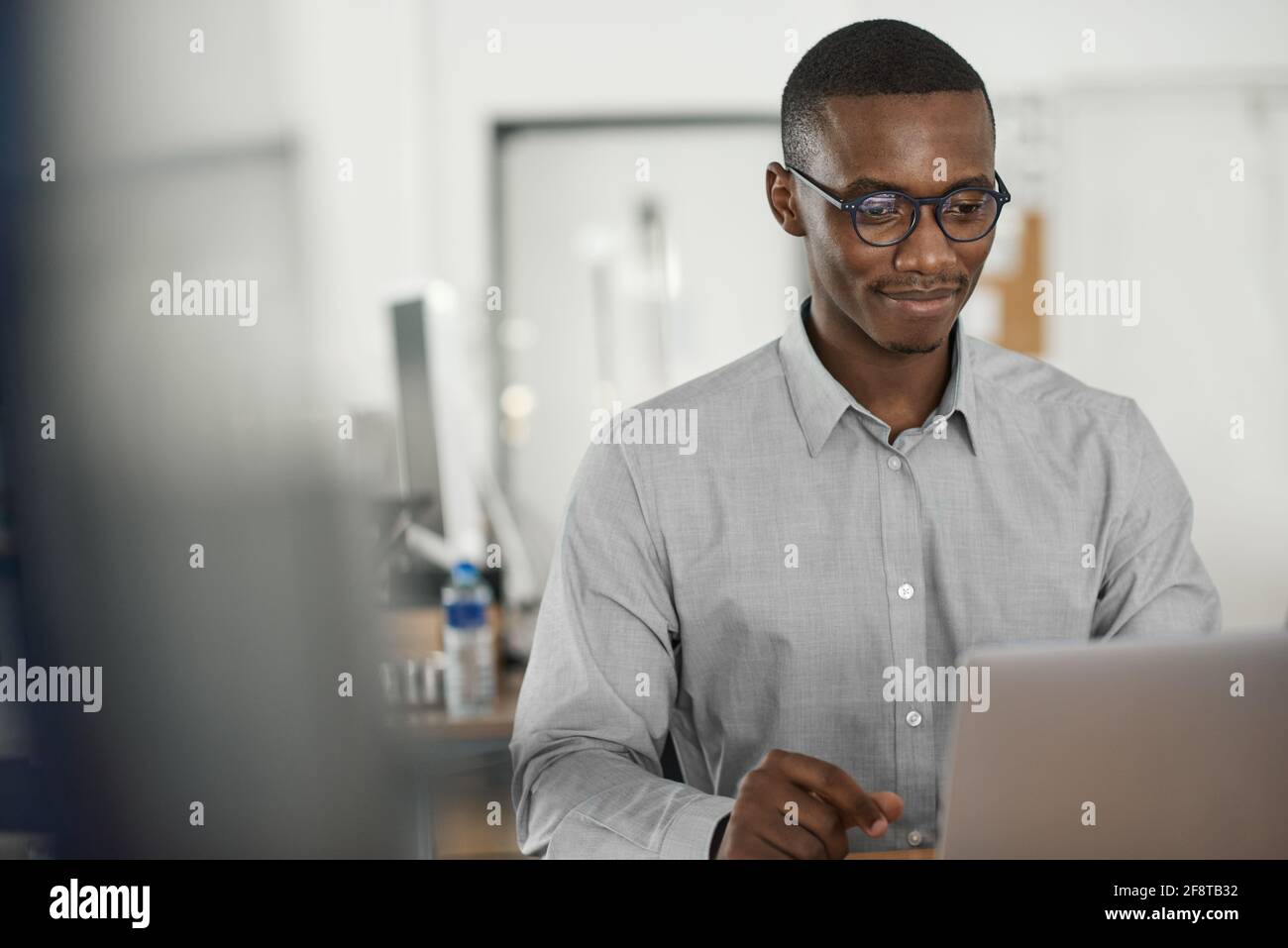 African american employee using laptop hi-res stock photography and ...