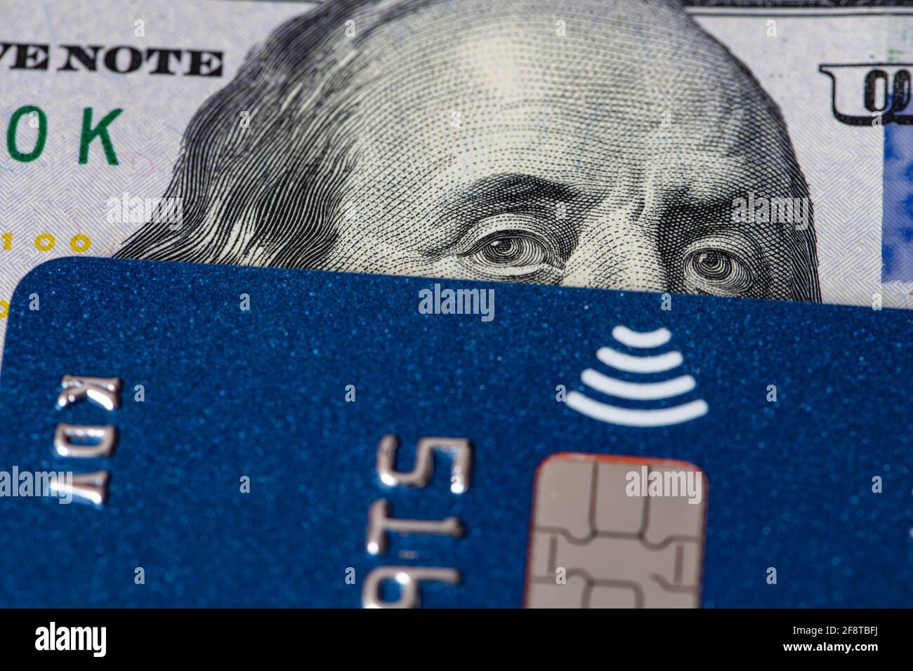 Debit card and US 100 dollar banknote for design purpose Stock Photo ...