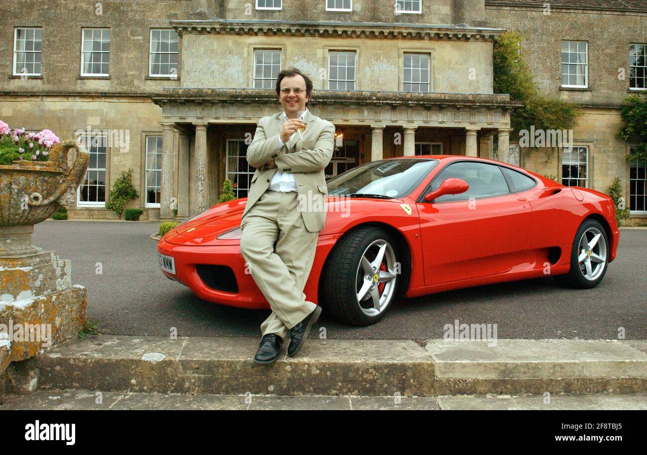 SEAN O'GRADY WITH A FERRARI AT LUCKHAM PARK HOTEL.14/6/05 TOM PILSTON ...