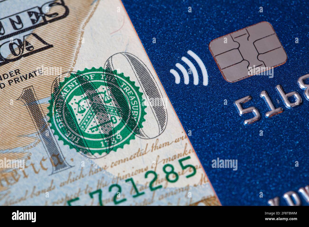 Debit card and US 100 dollar banknote for design purpose Stock Photo ...